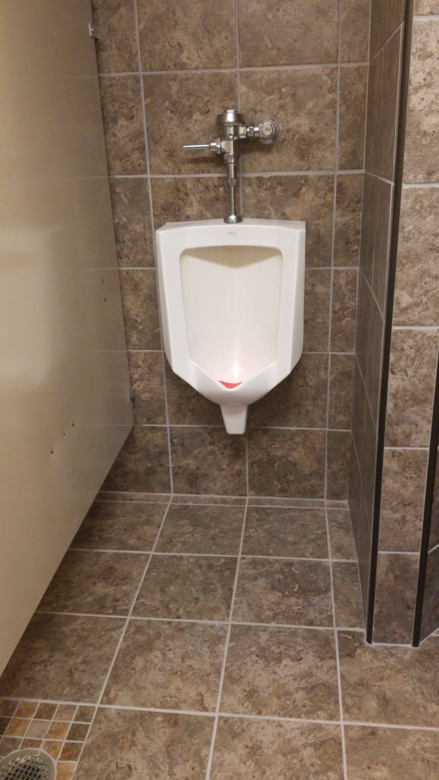 Men's common restroom remodel - Brook Pointe Resort