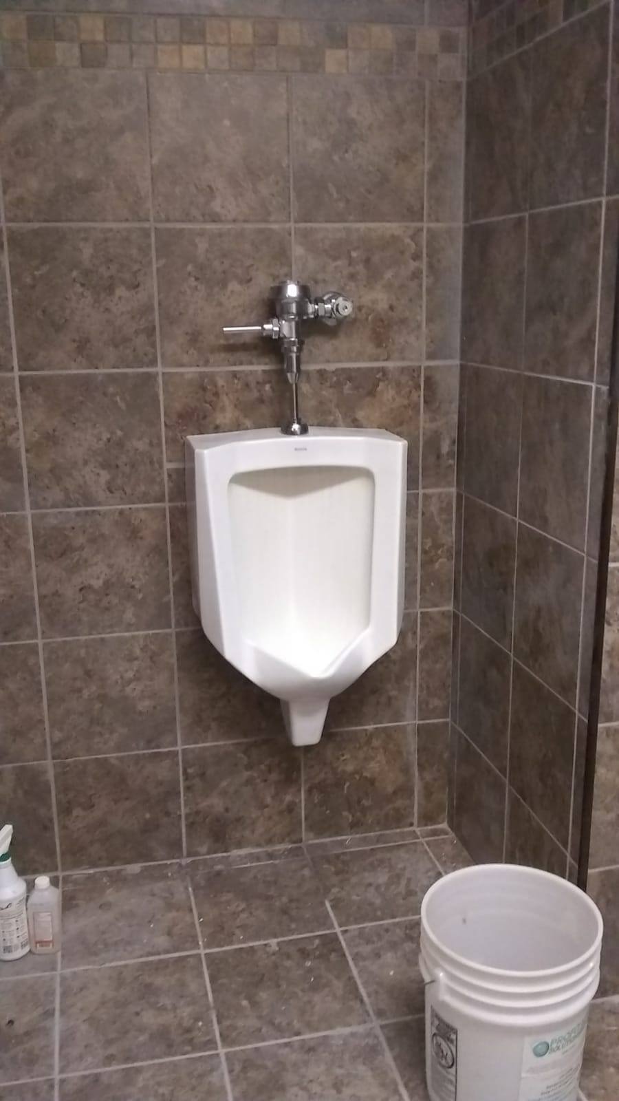 Men's common restroom remodel - Brook Pointe Resort